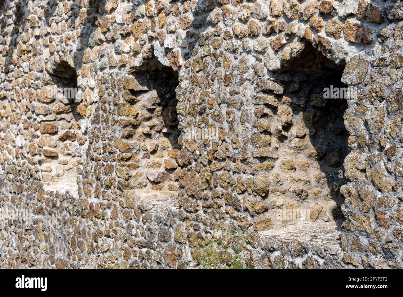 Medieval castle wall with loopholes Stock Photo - Alamy