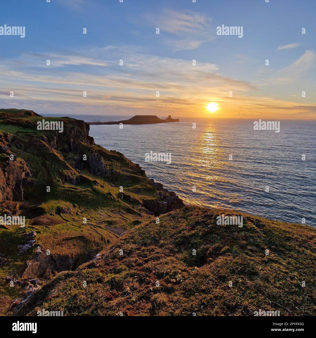 In this breathtaking photograph, the sun sets behind the iconic Worm's ...