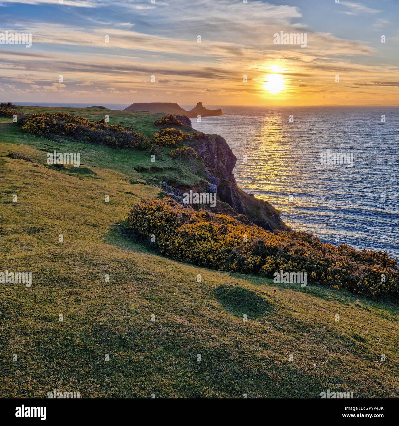 In this breathtaking photograph, the sun sets behind the iconic Worm's ...