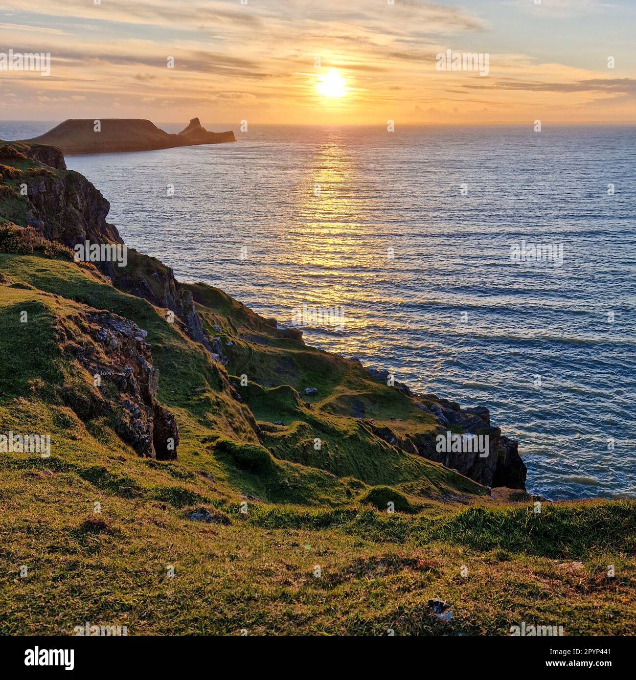 In this breathtaking photograph, the sun sets behind the iconic Worm's ...