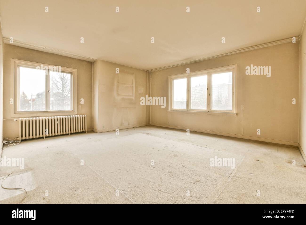 an empty living room with no one on the floor or furniture can be seen ...