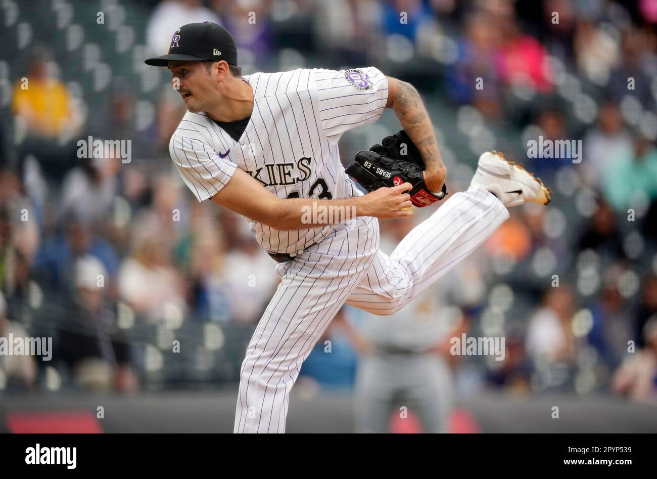 Colorado Rockies starting pitcher Connor Seabold works against the ...