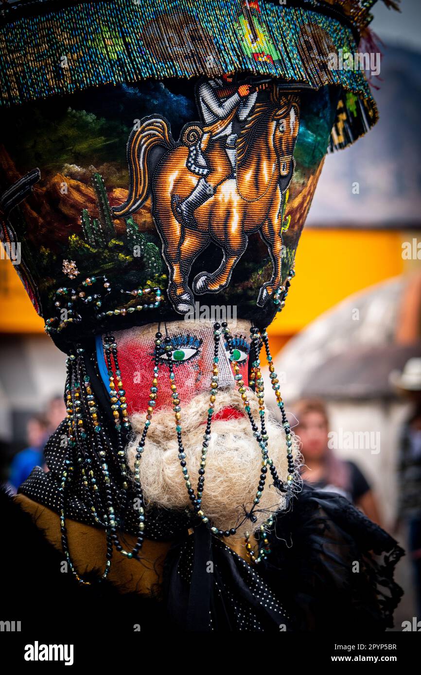 Chinelos are a traditional colorful costumed dancer in carnaval, is ...