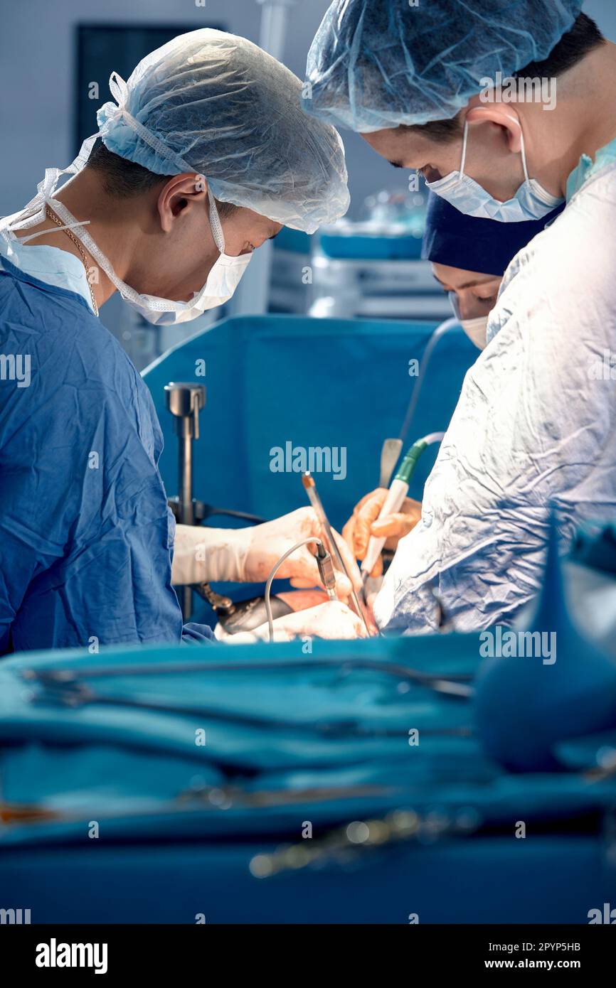 Man bent over doctor hi-res stock photography and images - Alamy
