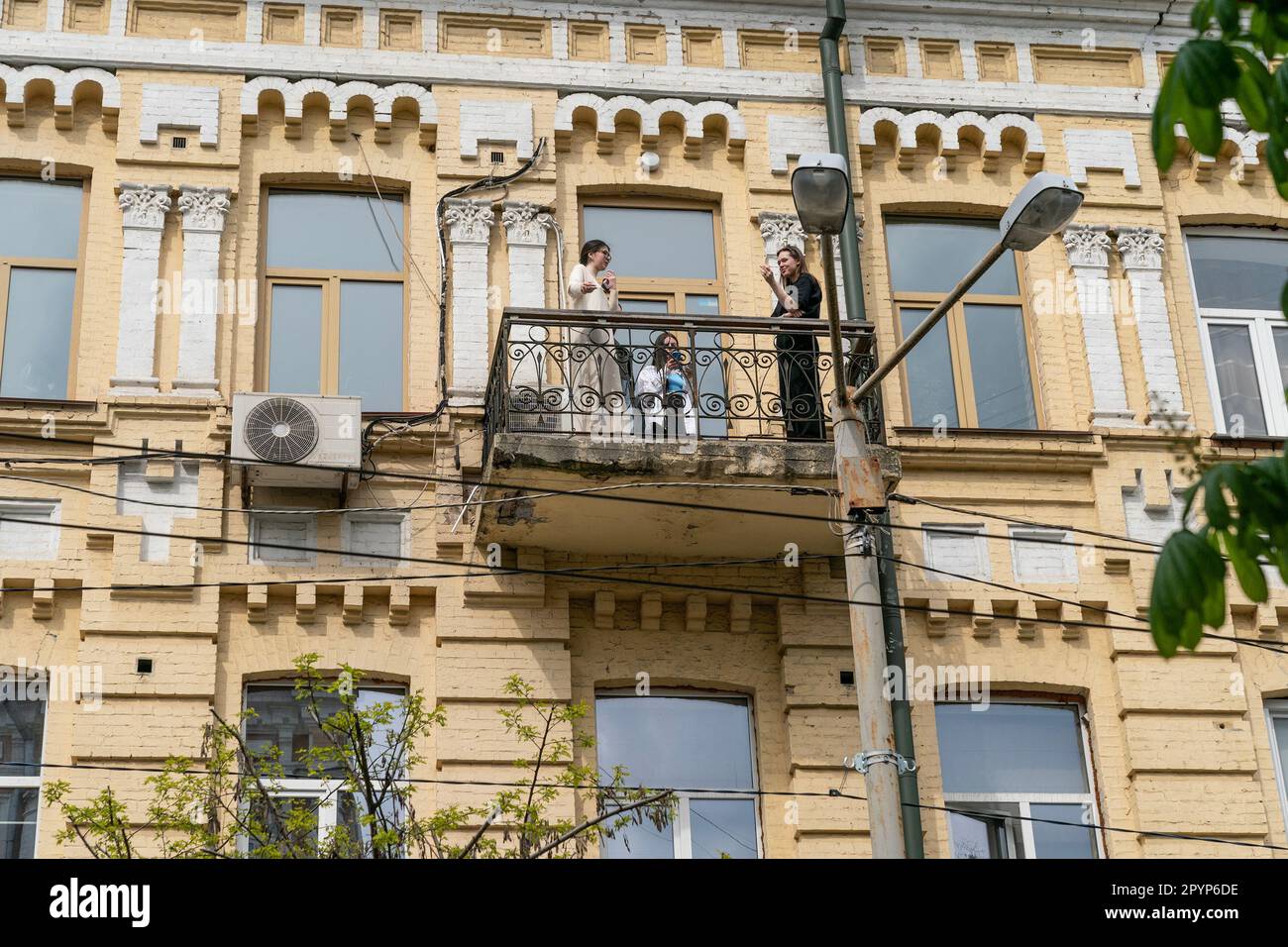 Smoking on balcony hi-res stock photography and images - Alamy