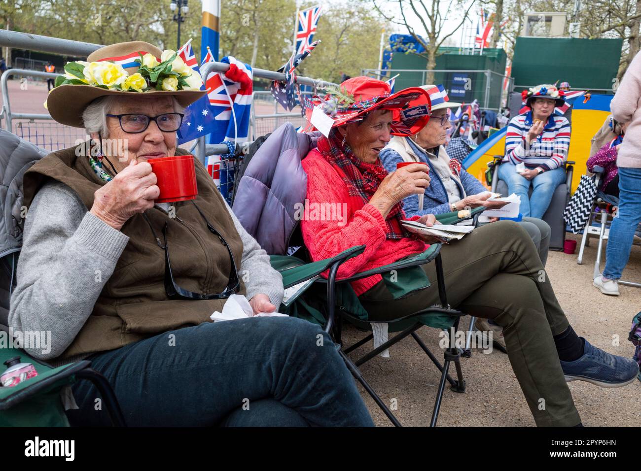 London, UK. 4 May 2023. Royal superfans sipping tea after arriving ...