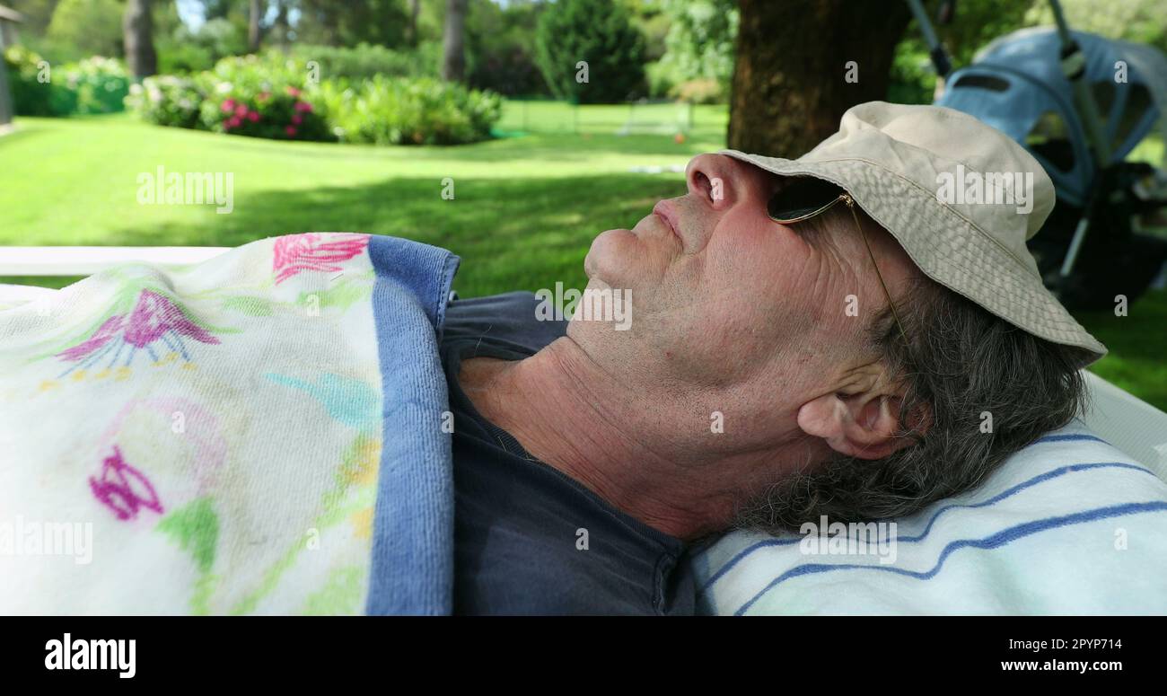 Man asleep outside face hi-res stock photography and images - Alamy
