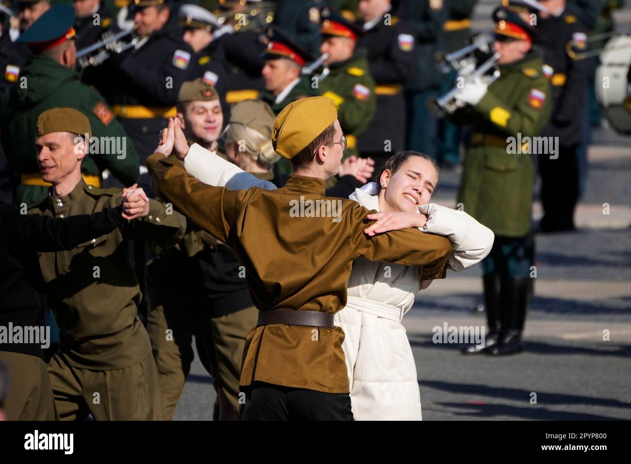Actors wearing World War II age Soviet army uniform dance during a ...