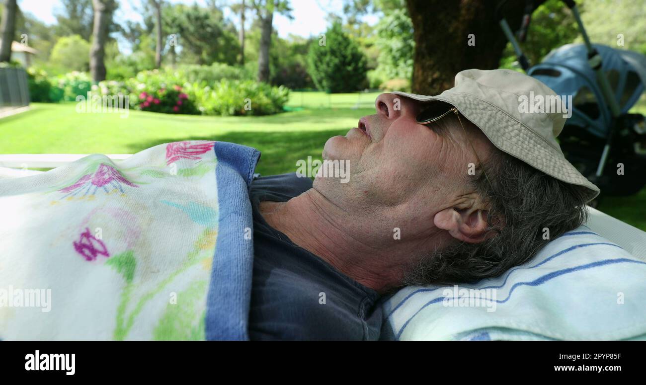 Exhausted older man sleeping during summer day Stock Photo - Alamy