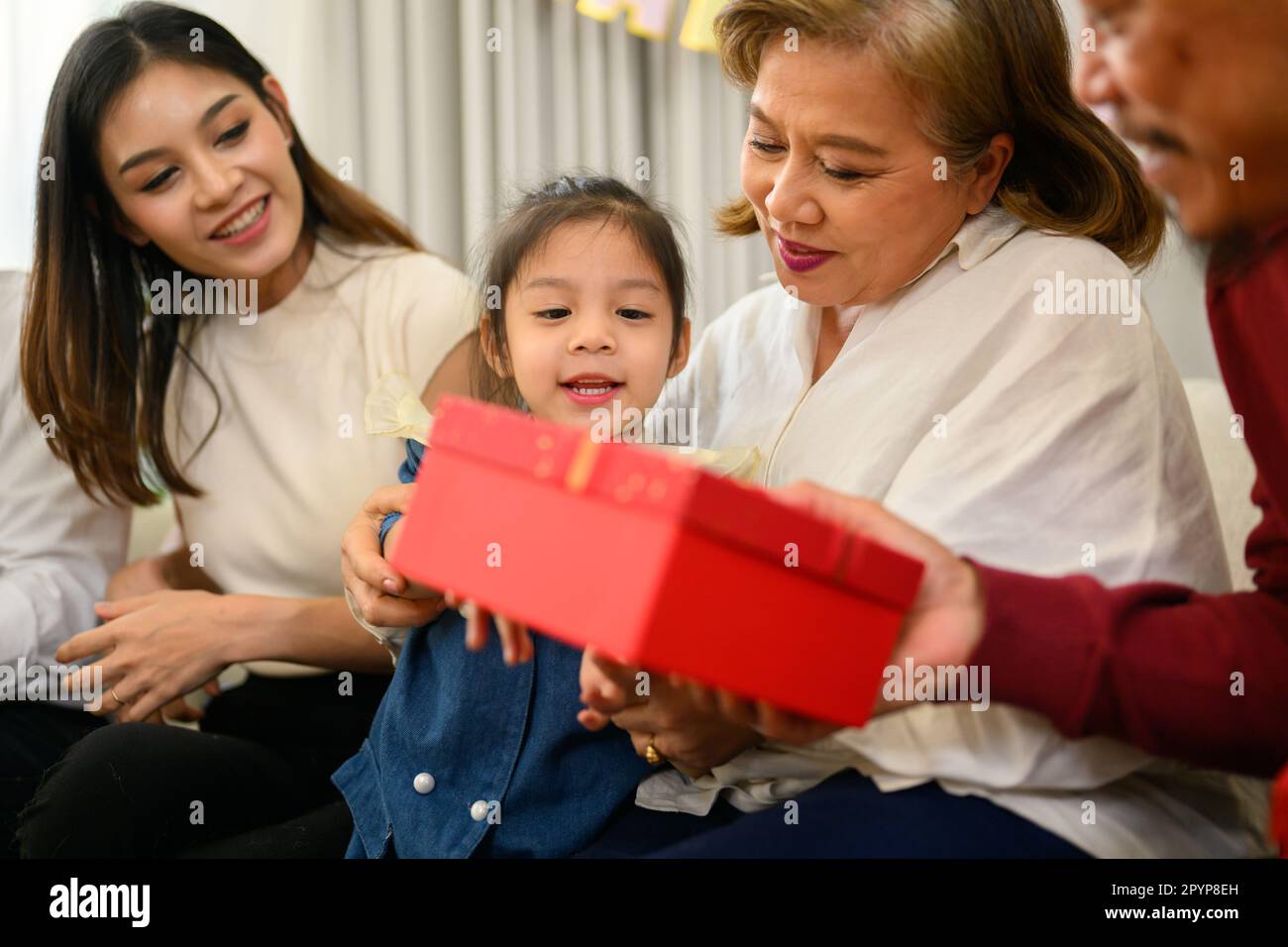 Happy and cheerful family spending good time together at home Stock ...
