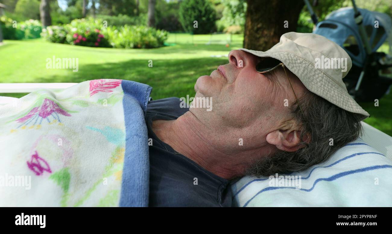 Man asleep outside face hi-res stock photography and images - Alamy