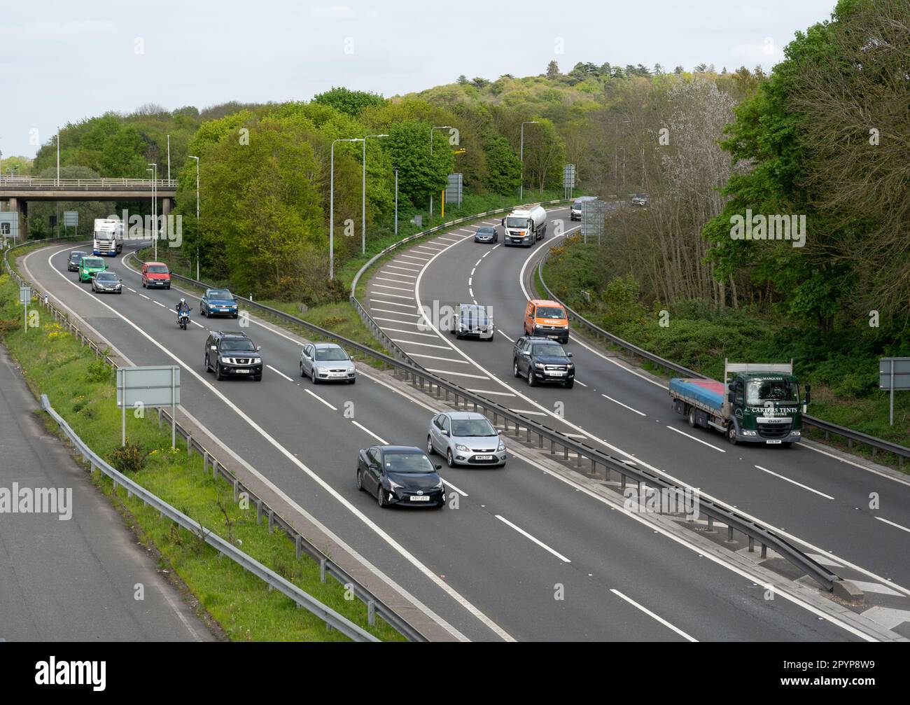 Traffic on the M25 at the Thorpe interchange. The M3 and M25 smart ...