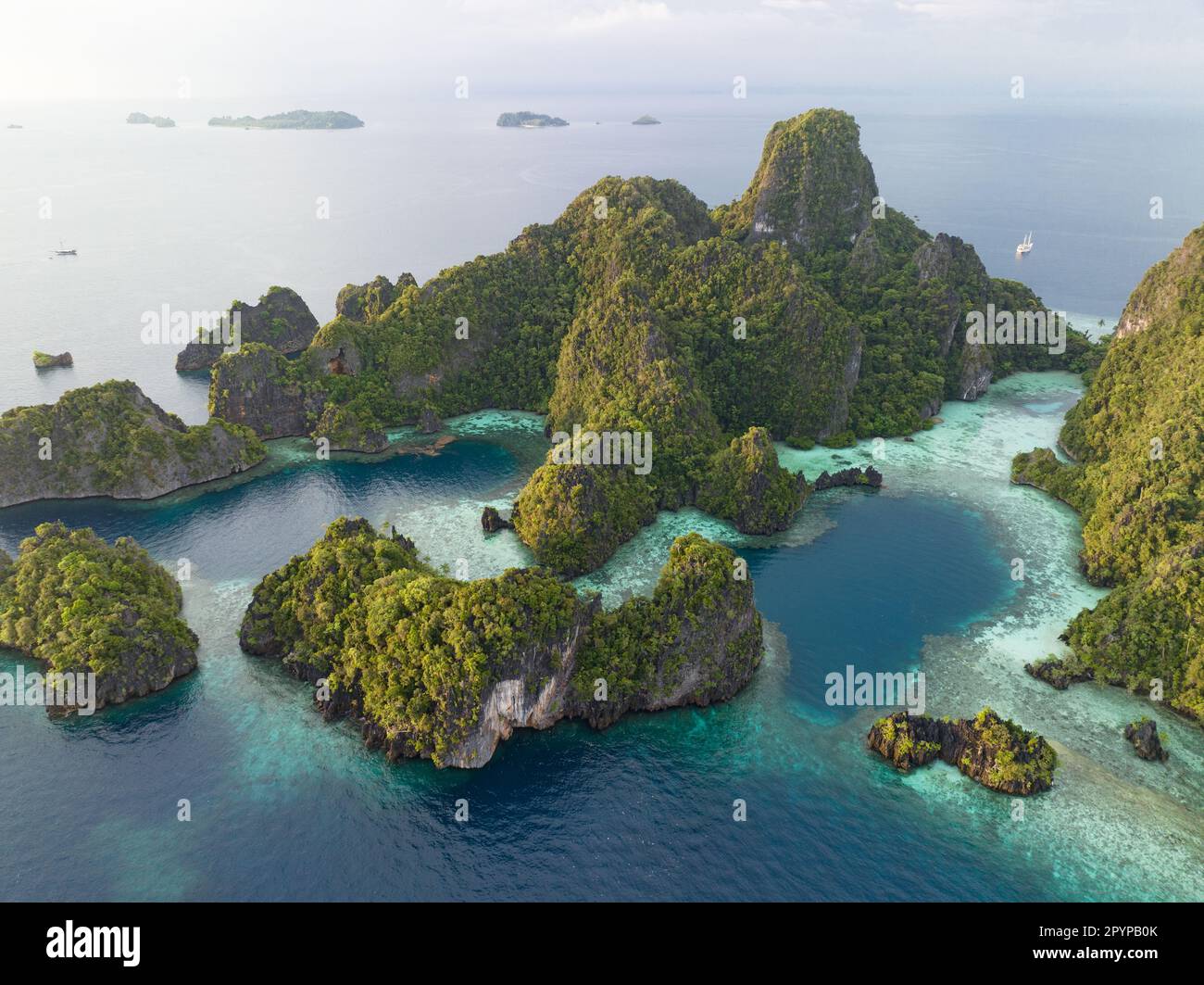 Coral reefs surround the dramatic limestone islands that have been ...