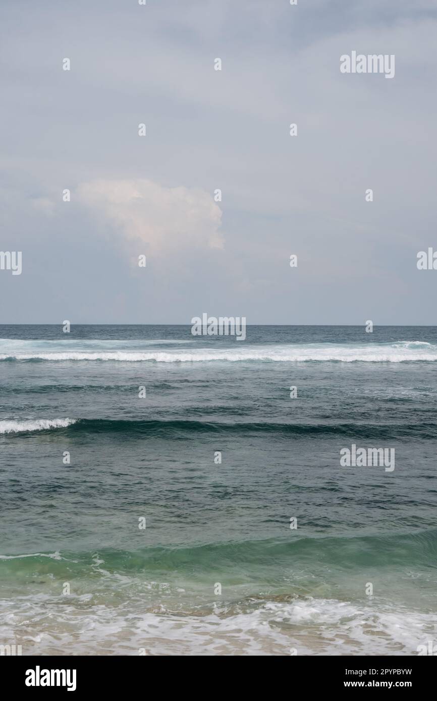 Tropical sunny Bali beach with turquoise ocean water, sea and sky ...