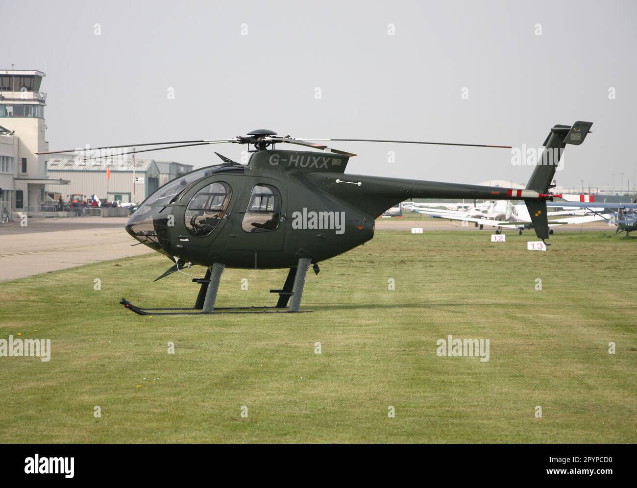 An MD Helicopters 369E departing Brighton City Airport West Sussex ...