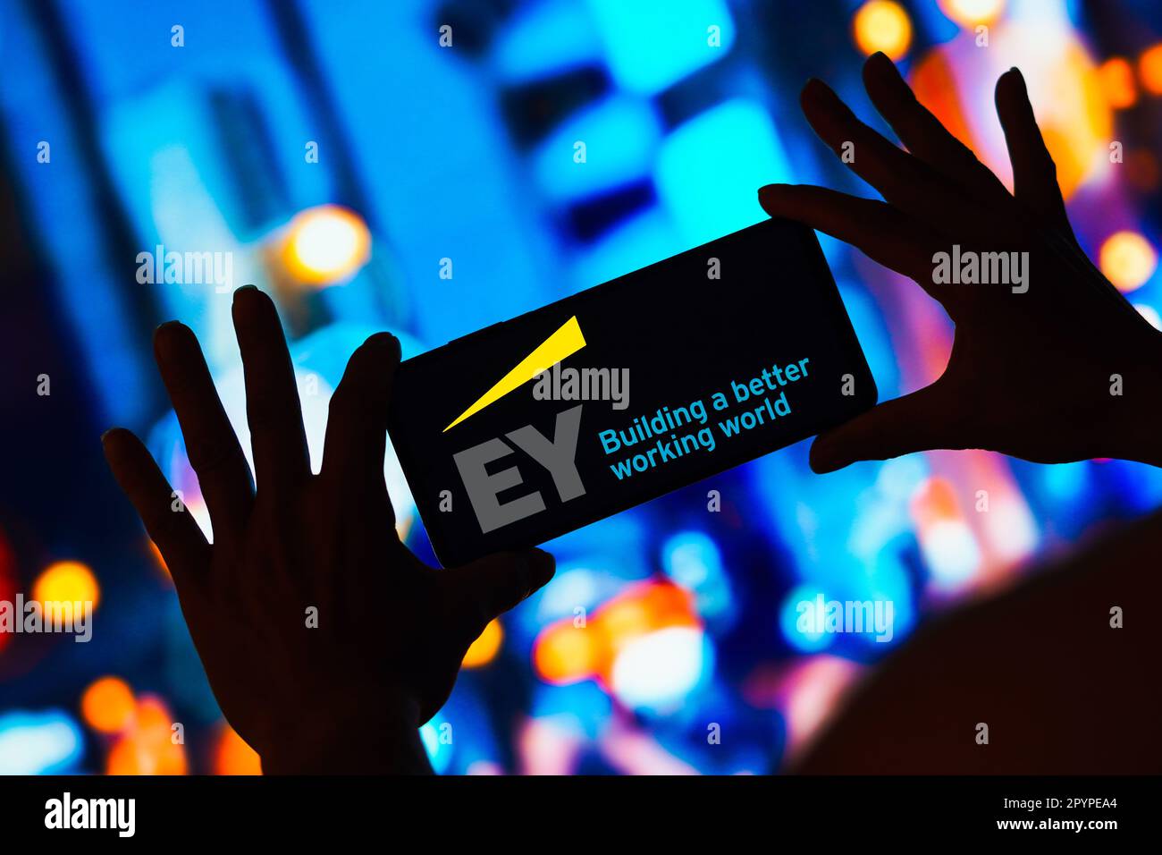 In this photo illustration, the Ernst and Young Global Limited (EY ...