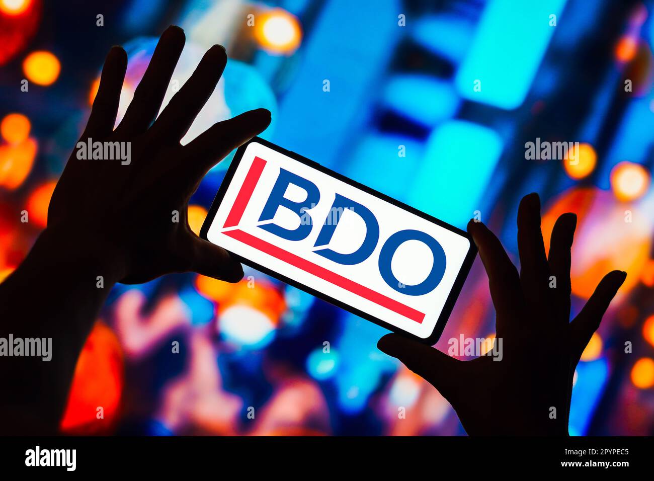 In this photo illustration, the BDO logo is displayed on a smartphone ...