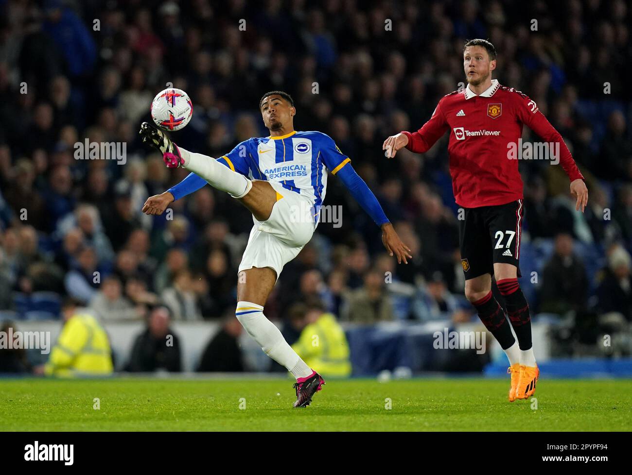 Brighton and Hove Albion's Levi Colwill (left) and Manchester United's ...
