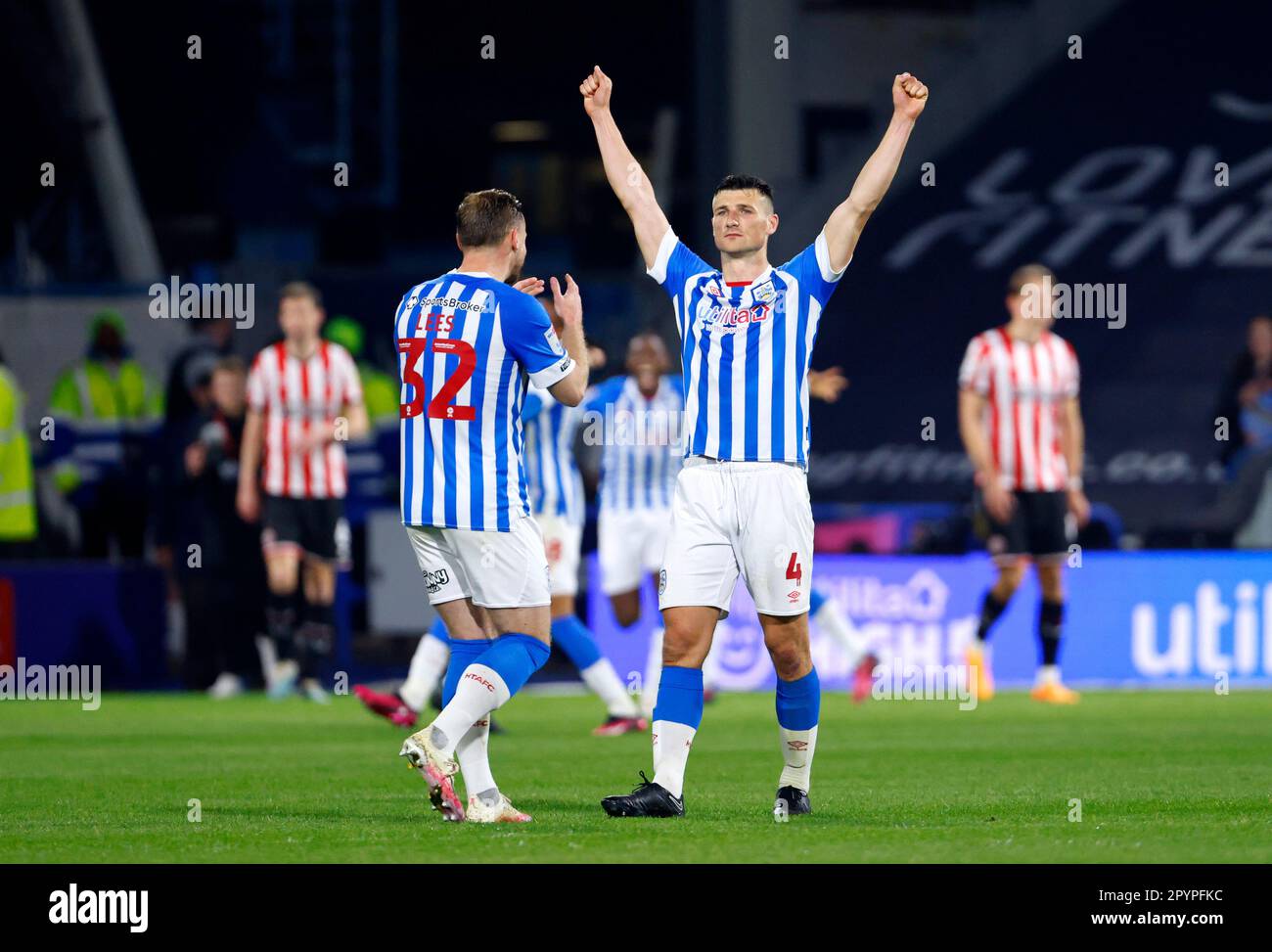 Huddersfield Town's Matty Pearson (right) celebrates at the end of the ...