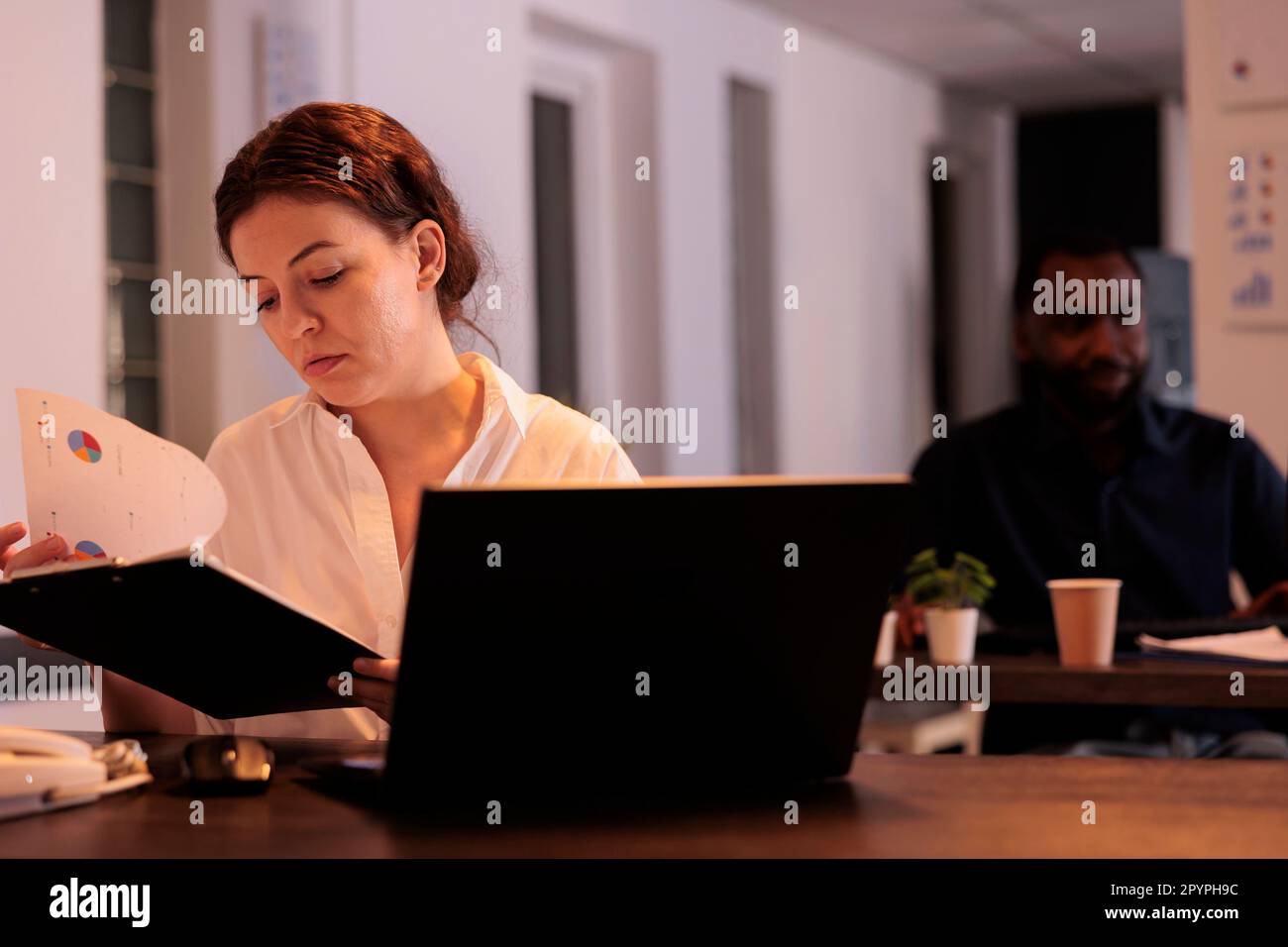 Woman Reading Annual Report Analyzing Statistics Data Analyst