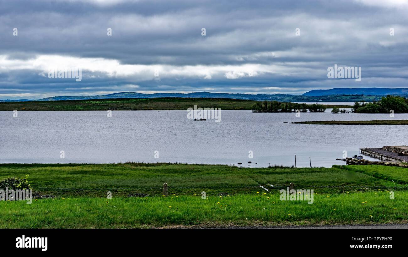 A view of Lough Erne in Co Fermanagh, Northern Ireland as a small boat ...