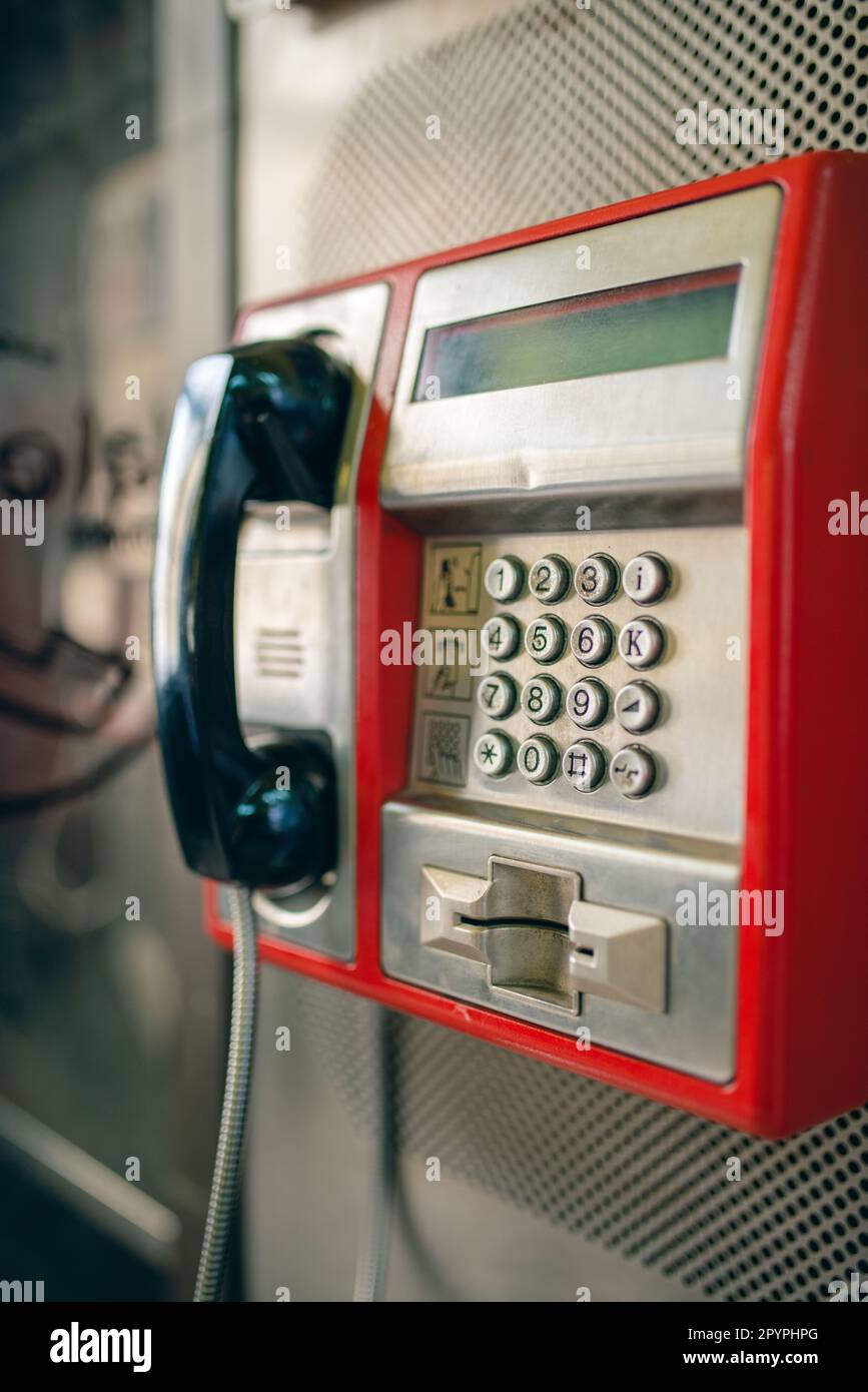 Red retro public payphone Stock Photo - Alamy