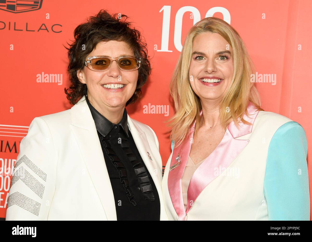 GLAAD president and CEO Sarah Kate Ellis, right, and wife Kristen Ellis ...