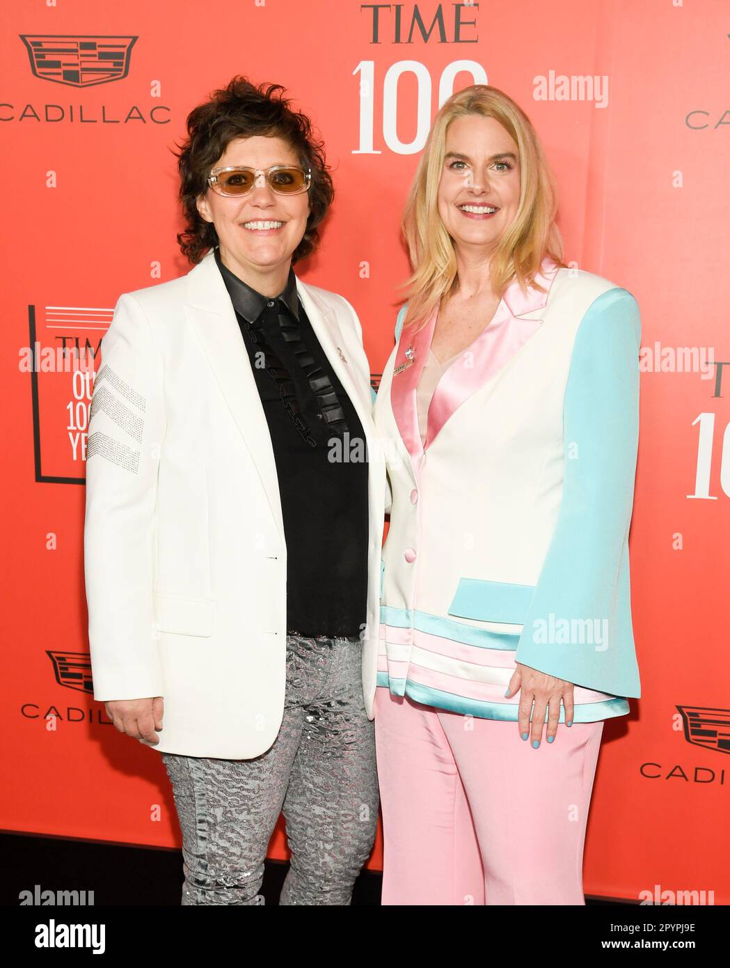 GLAAD president and CEO Sarah Kate Ellis, right, and wife Kristen Ellis ...