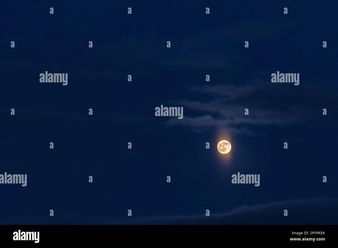 Full moon between clouds hi-res stock photography and images - Alamy