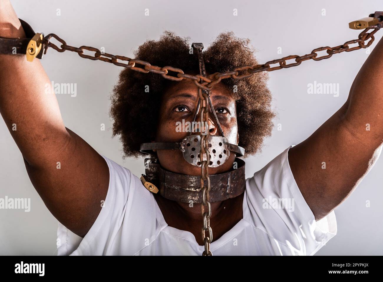 Portrait of a black woman in chains, representing the slave Anastacia ...
