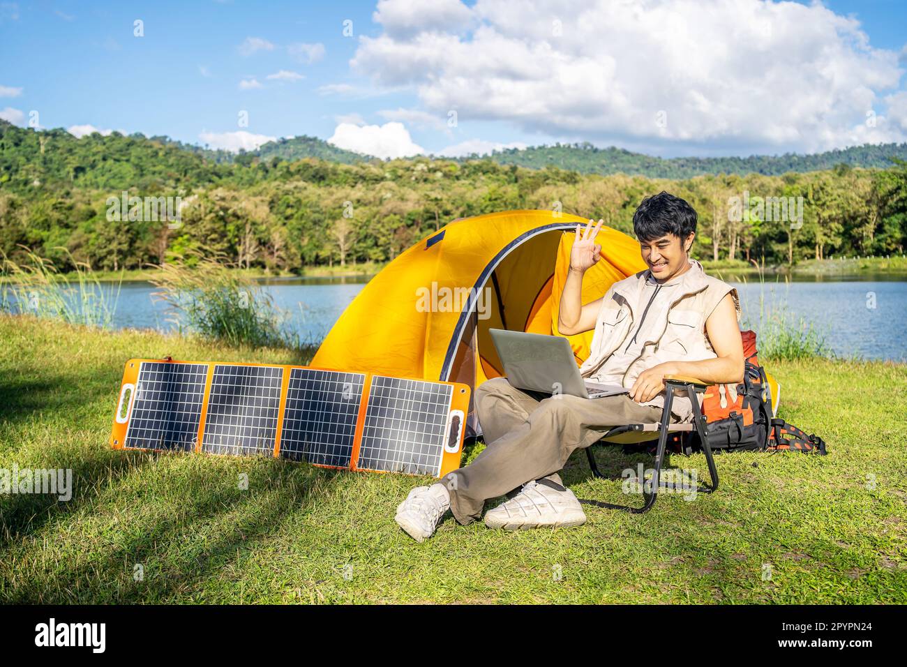 Young travel man relax and enjoy talking calling on video on laptop ...