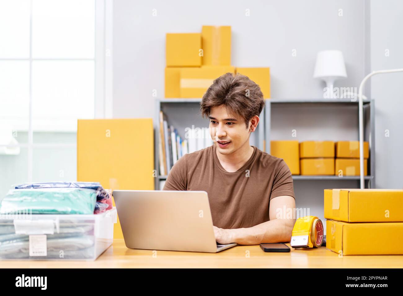 Entrepreneurs Small Business SME freelance working in home office using ...