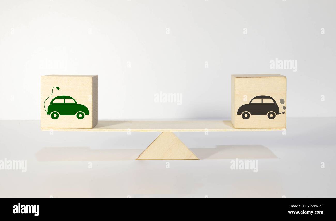 Top view of green electric car between polluting fossil combustion ...