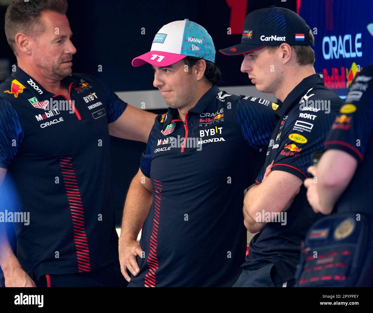Red Bull drivers Sergio Perez, second from left, of Mexico, and Max ...