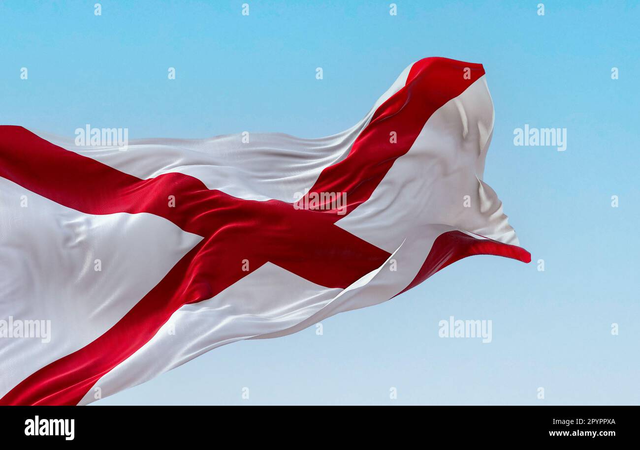 The state flag of Alabama waving in the wind on a clear day. Saint ...