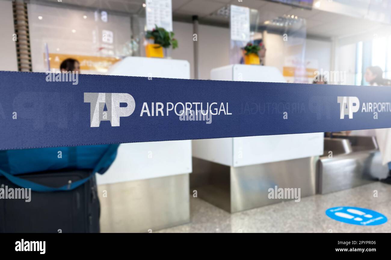 Lisbon, PT Jan 2023: Blue retractable belt barrier with white TAP Air ...