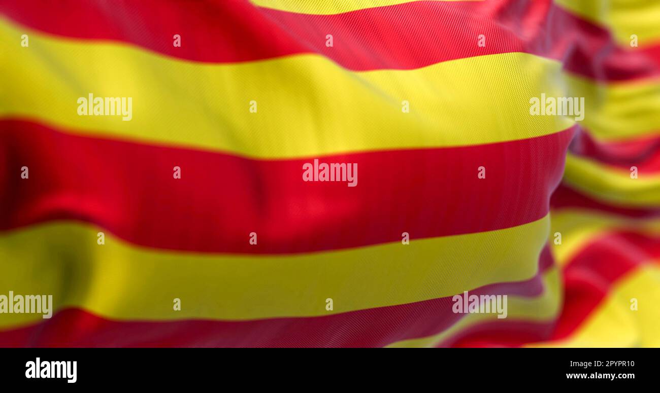 Detail of the Catalonia flag waving in the wind. Catalonia is an ...