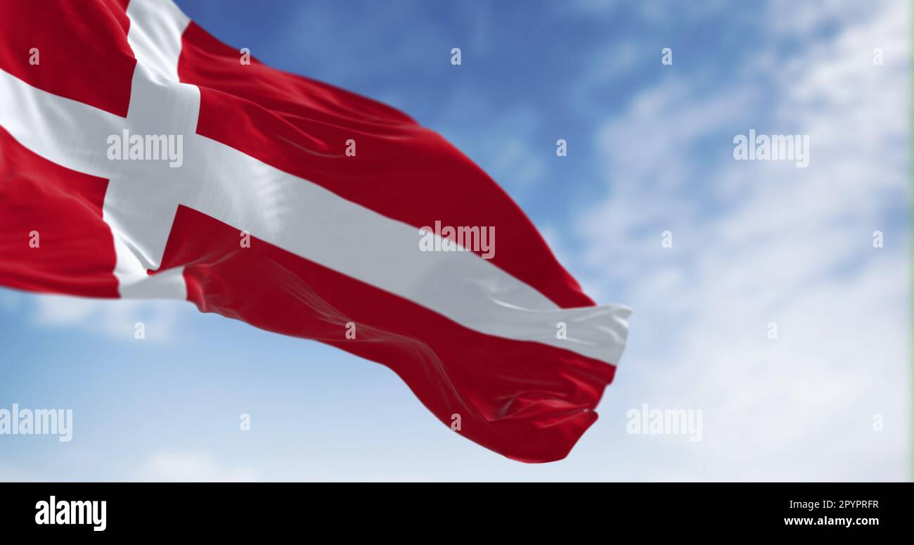 Denmark national flag waving in the wind on a clear day. The Kingdom of ...