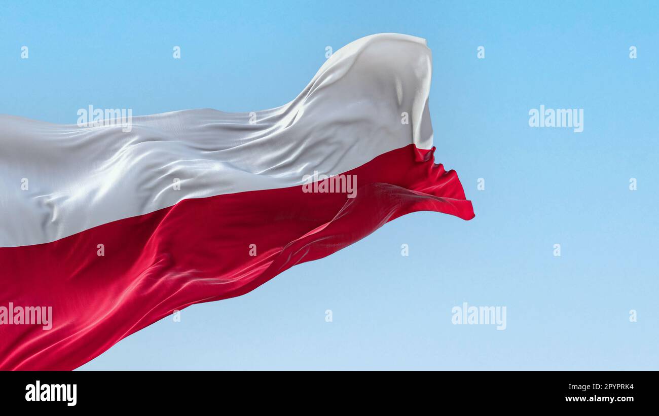 The national flag of Poland waving in the wind on a clear day. Two ...