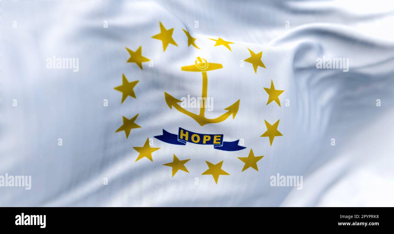 Close-up of the Rhode Island state flag waving. Gold anchor in the ...