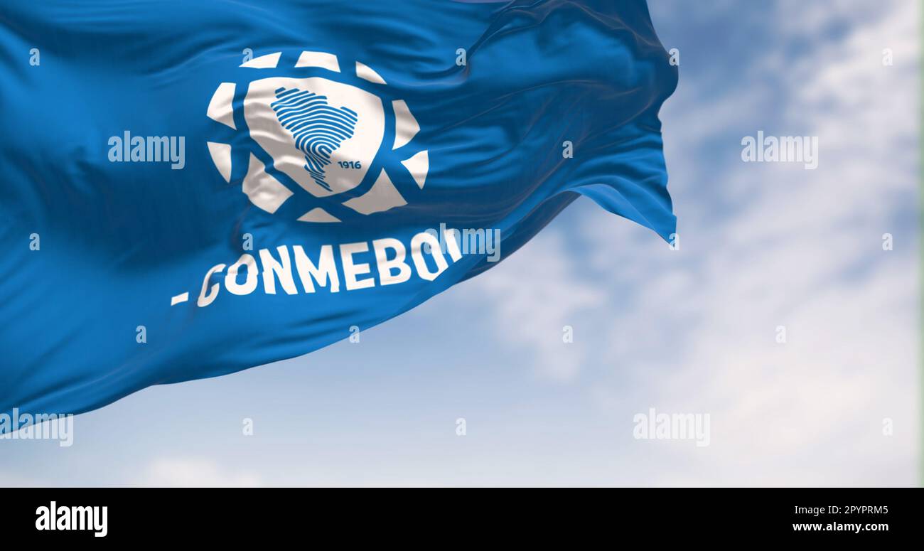 Luque, PAR, april 2023: CONMEBOL lflag waving in the wind on a clear ...