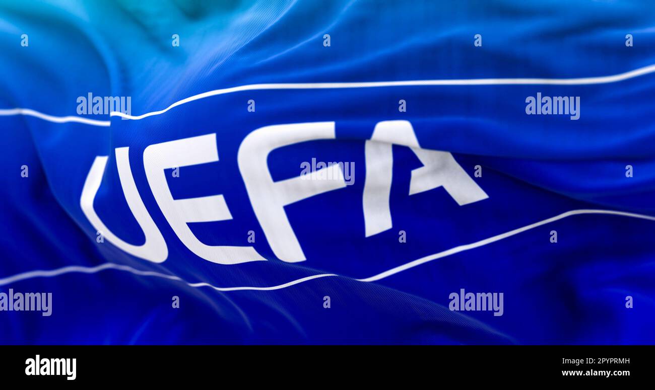 Nyon, CH, April 2023: Close-up of UEFA flag waving in the wind. UEFA is ...