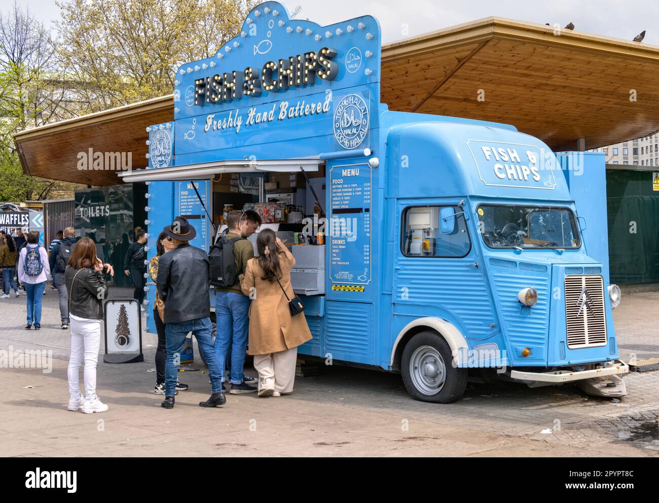 Bright blue old fashioned van selling Fish & Chips along the Southbank ...