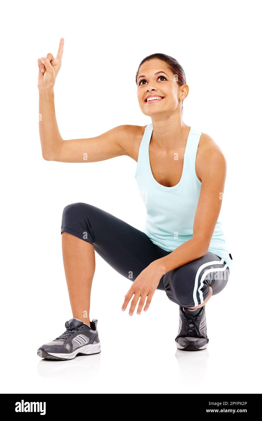 Moving up in the fitness world. An attractive young woman in gymwear ...
