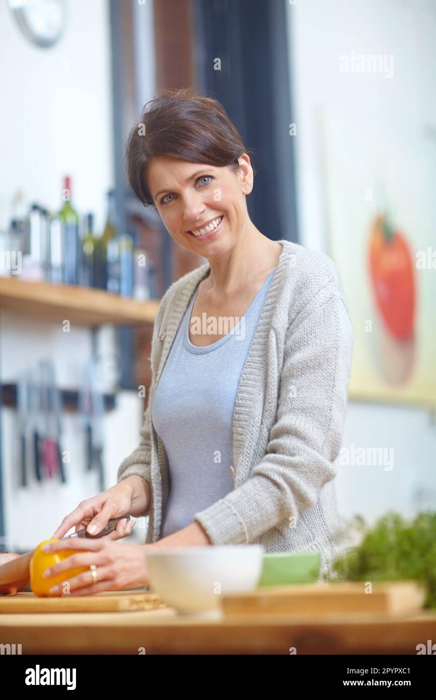 The beginnings of something delicious. Portrait of an attractive woman ...