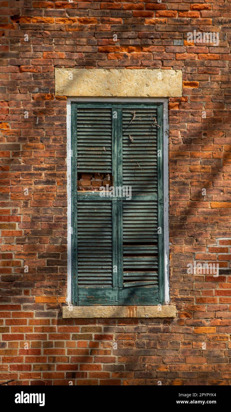 Brick wall with window hi-res stock photography and images - Alamy