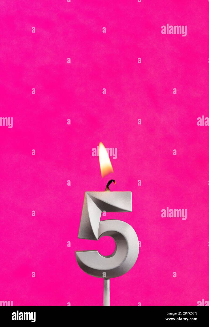 Candle 5 with flame - Silver anniversary candle on a fuchsia background ...