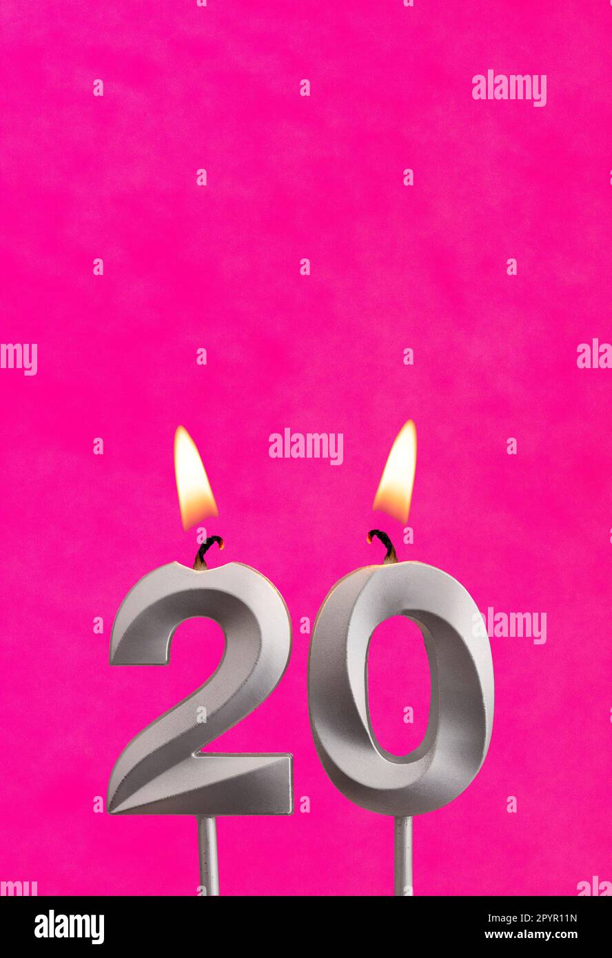 Number 20 candle - Birthday celebration on fuchsia background Stock ...