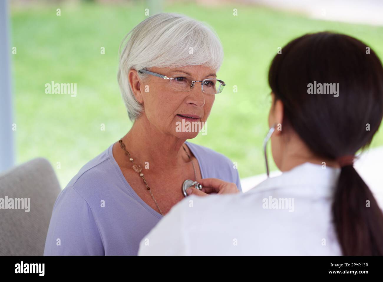 Managing her heart condition for a longer life. a senior woman looking ...