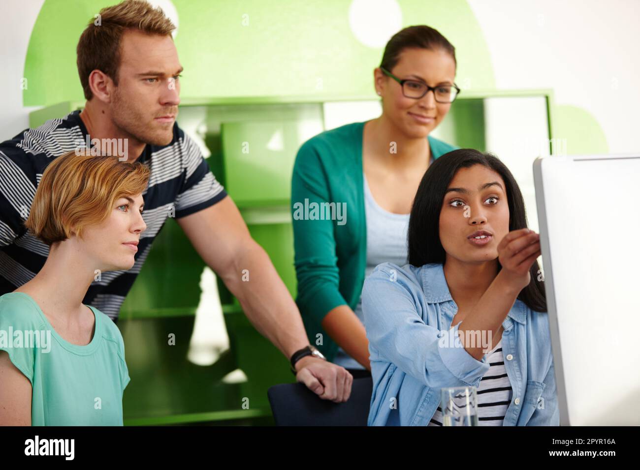 Combining their creative powers for greater results. a group of young ...